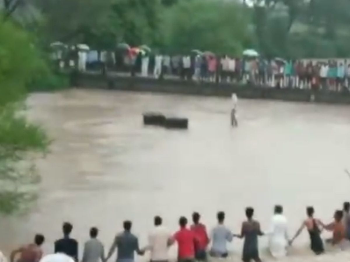 People Form Human Chain In Indore Stream To Save Men Who Got Washed Away