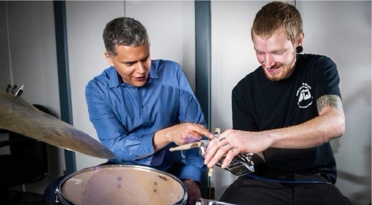 This Cyborg Musician Used His Cool Bionic Arm To Become The Fastest ...