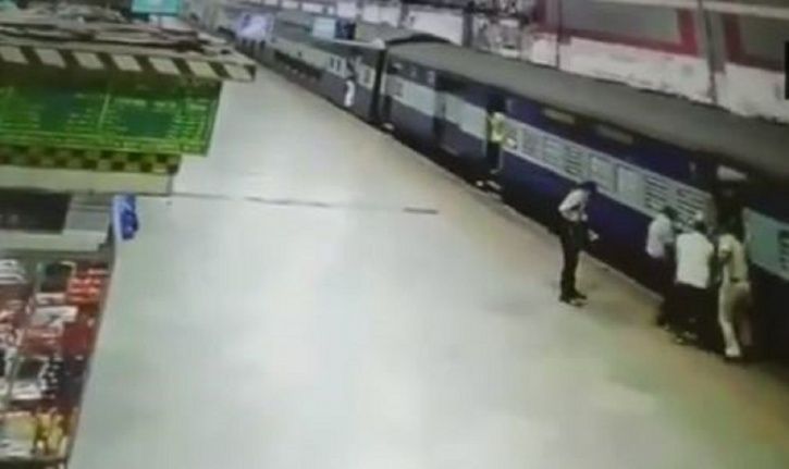 Mumbai Woman Loses Grip And Falls Under A Moving Train, Onlookers Come ...