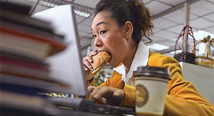 Here's Why Eating At Your Desk Will Make You And Your Work Suffer