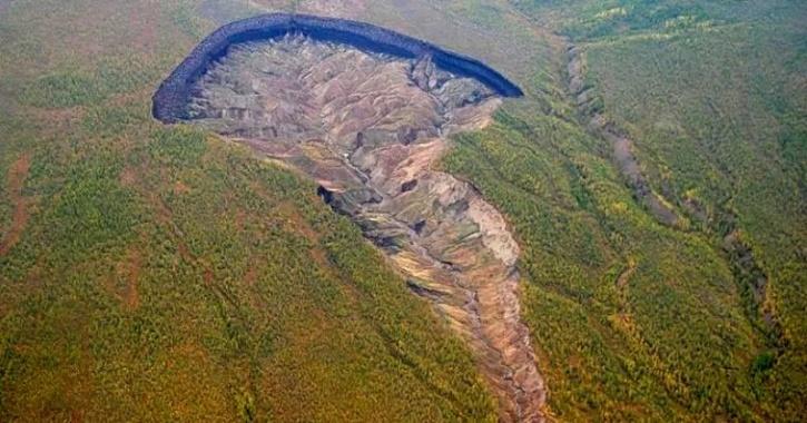 Russia's 100-Metre Deep 'Gateway To Underworld' Is Expanding Due To ...