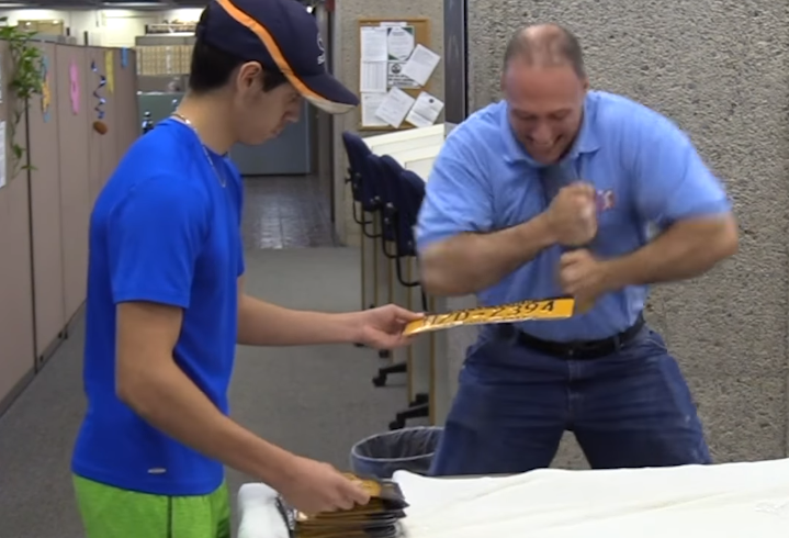 Man Tears Apart Metal Licence Plates With His Bare Hands