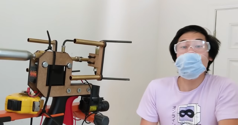 YouTuber Invents 'Face Mask Gun' To Shoot Masks Onto People's Faces