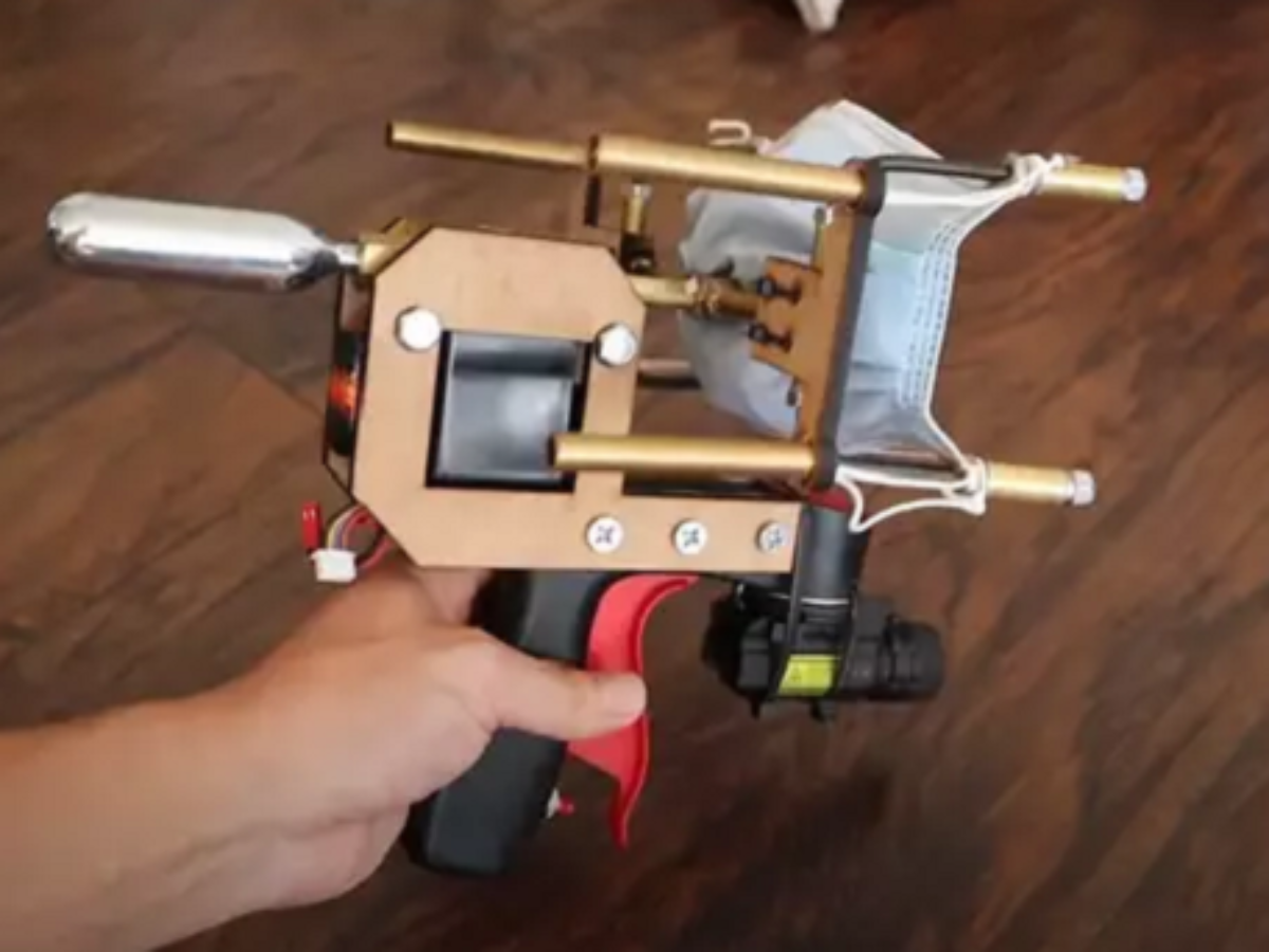 YouTuber Invents 'Face Mask Gun' To Shoot Masks Onto People's Faces
