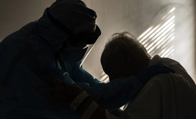 Doctor Hugs Elderly COVID-19 Patient In ICU