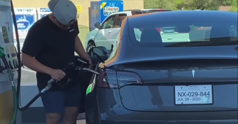 Watch A Man Try To Fill His Tesla Model 3 With Petrol!