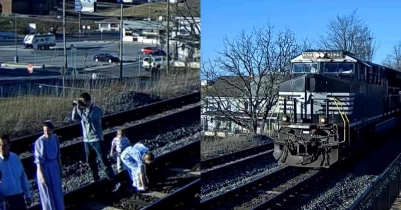 Family takes pics on railway tracks and has a close brush with death