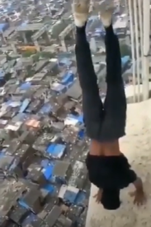 Mumbai Man Performs Dangerous Handstand On Ledge