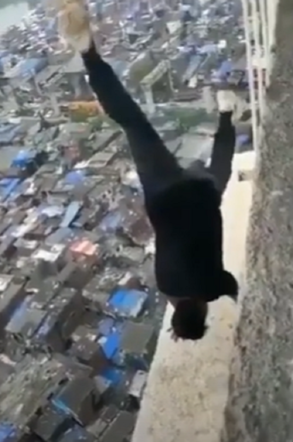 Mumbai Man Performs Dangerous Handstand On Ledge
