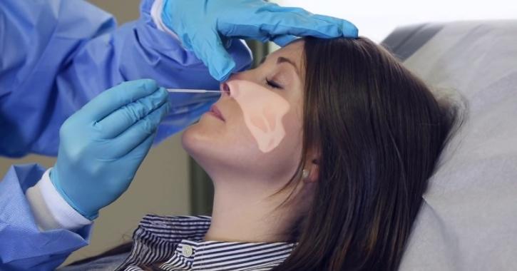 COVID-19 Nasal Swab Test Puncture US Woman's Brain Lining