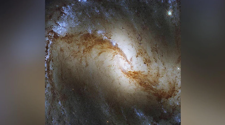 NASA Has Just Captured 'Fiery' Swirl Of Stars 60 Mn Light Yrs From ...