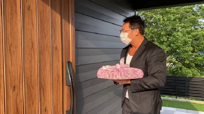 Sushi Delivered By Bodybuilders In Japan