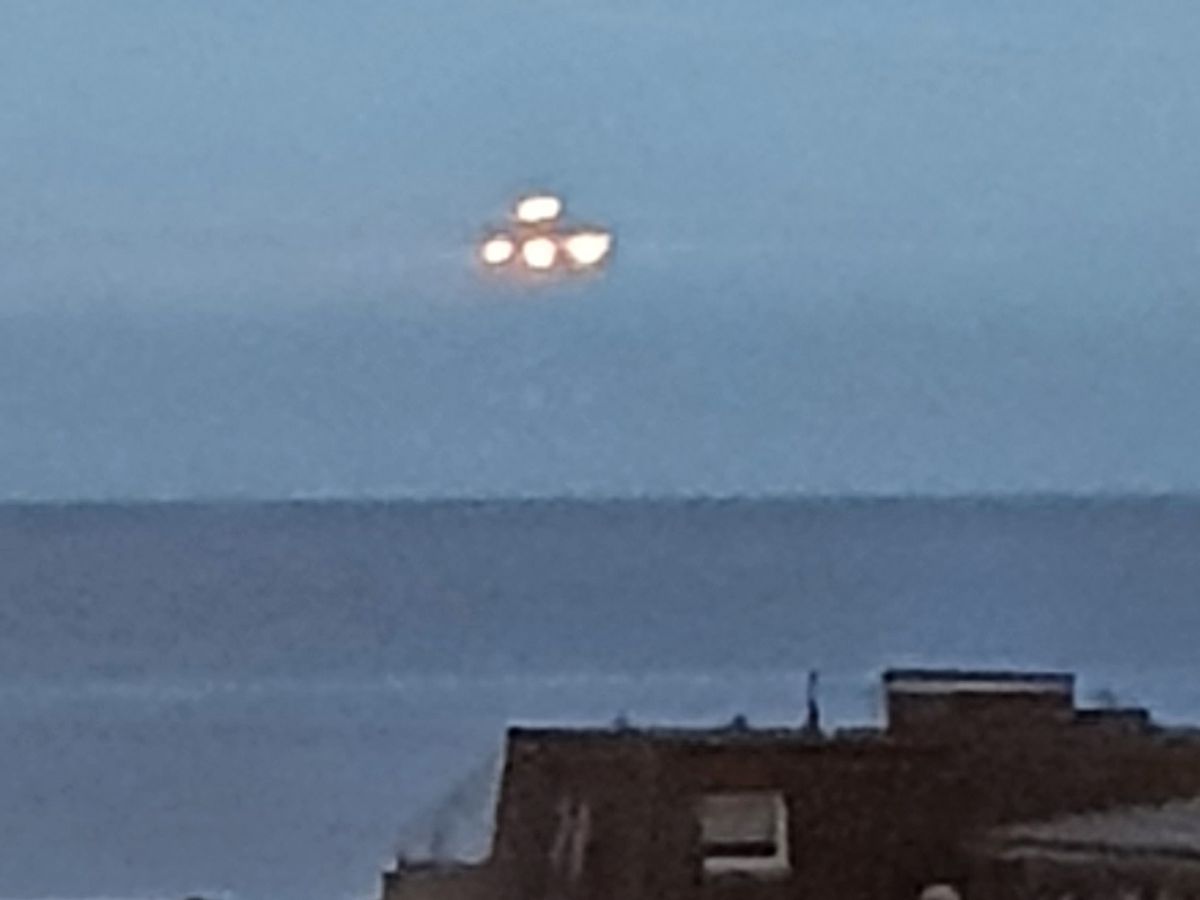 UK Student Captures 'Large UFO' Hovering Over Seafront At Night