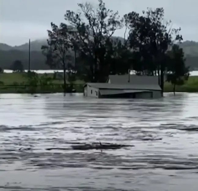 Couple Forced To Flee To Safety As Floods Wash Away Their Home On Their ...