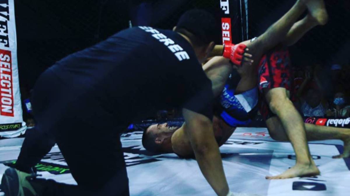 Referee Chokes MMA fighter After He Refused To Release Tapping Opponent
