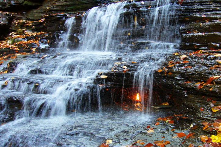 Eternal Flame Falls: A Waterfall With A Perennial Flame Of Fire