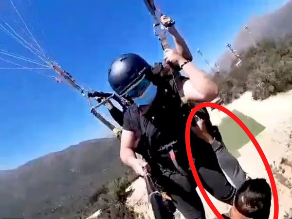 Instructor Left Hanging From Paraglider
