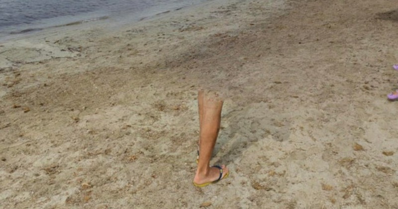 Holiday Photo Shows Just One Foot On Beach