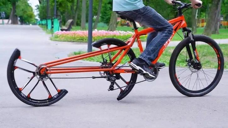 Man Builds Bicycle With Rear Wheel Split Into Two Half Wheels