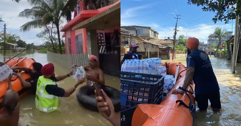 Khalsa Aid Workers Cross Chest-deep Flood Water, Travel In Boats To ...