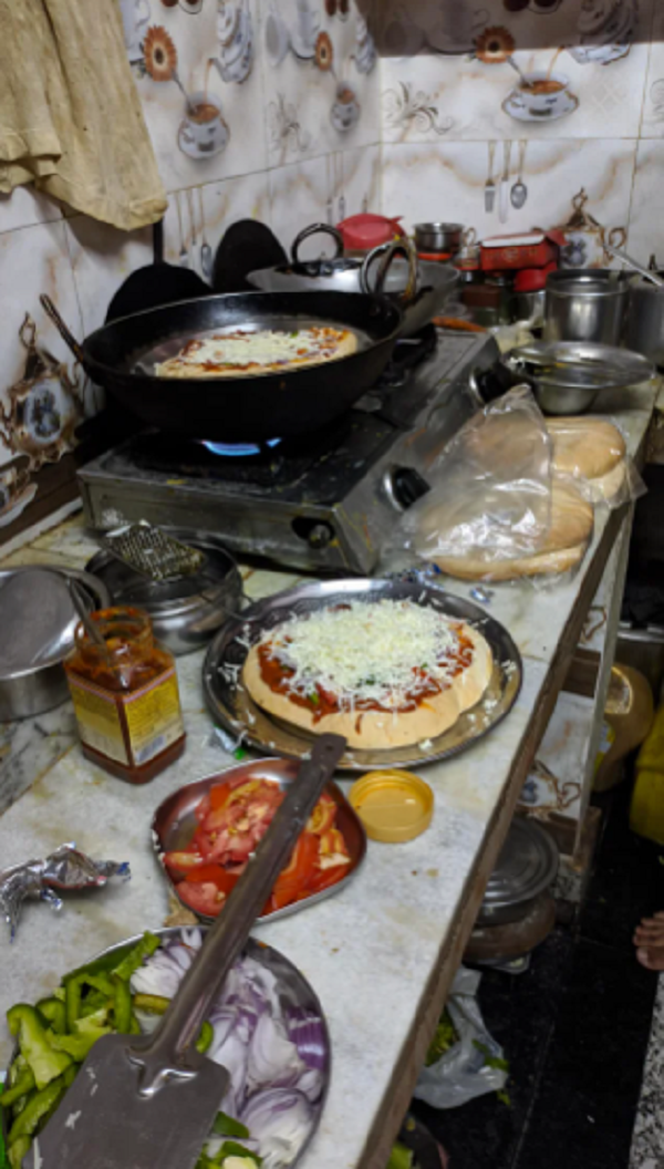 Reddit User Shares Picture Of Makeshift Home Pizza Oven