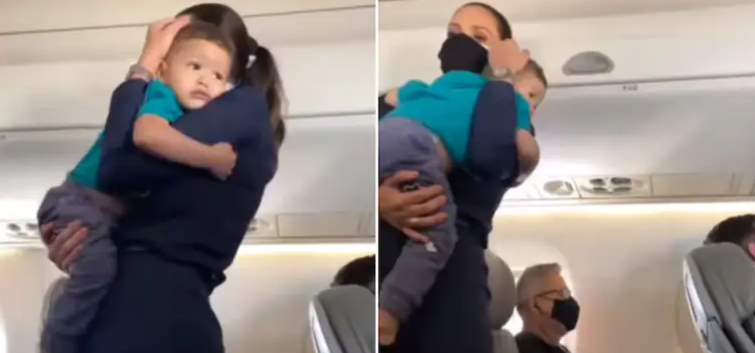 Flight Attendant Calms Down Crying Baby On Airplane