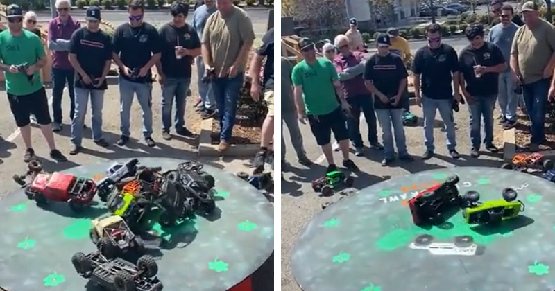 Group Of Men Battling It Out With Remote-controlled Cars