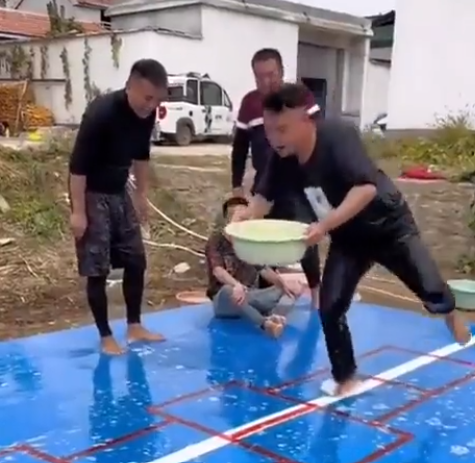 Men Play Stapoo In Soapy Water, Keep Falling