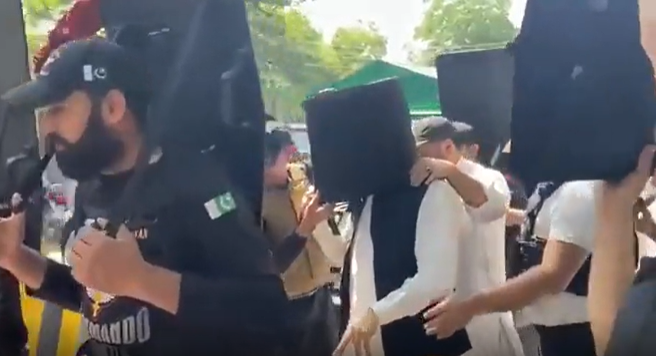 Imran Khan Reaches Court With Bulletproof Bucket On His Head Imran Khan Reaches Court With Bulletproof Bucket On His Head
