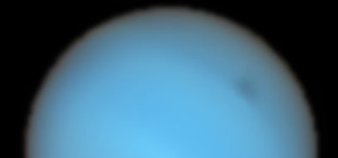 Astronomers Capture Spectacular View Of Neptune's Mysterious Dark Spot