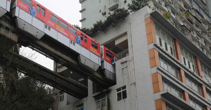Train In China Passes Directly Through Block Of 19-Storey Flats