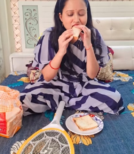 Woman Toasts Bread On Mosquito Racket To Make 'Macchar Toast'