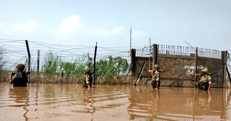 Pics Of BSF Jawans Braving Floods, Guarding Border In Waist-Deep Water ...