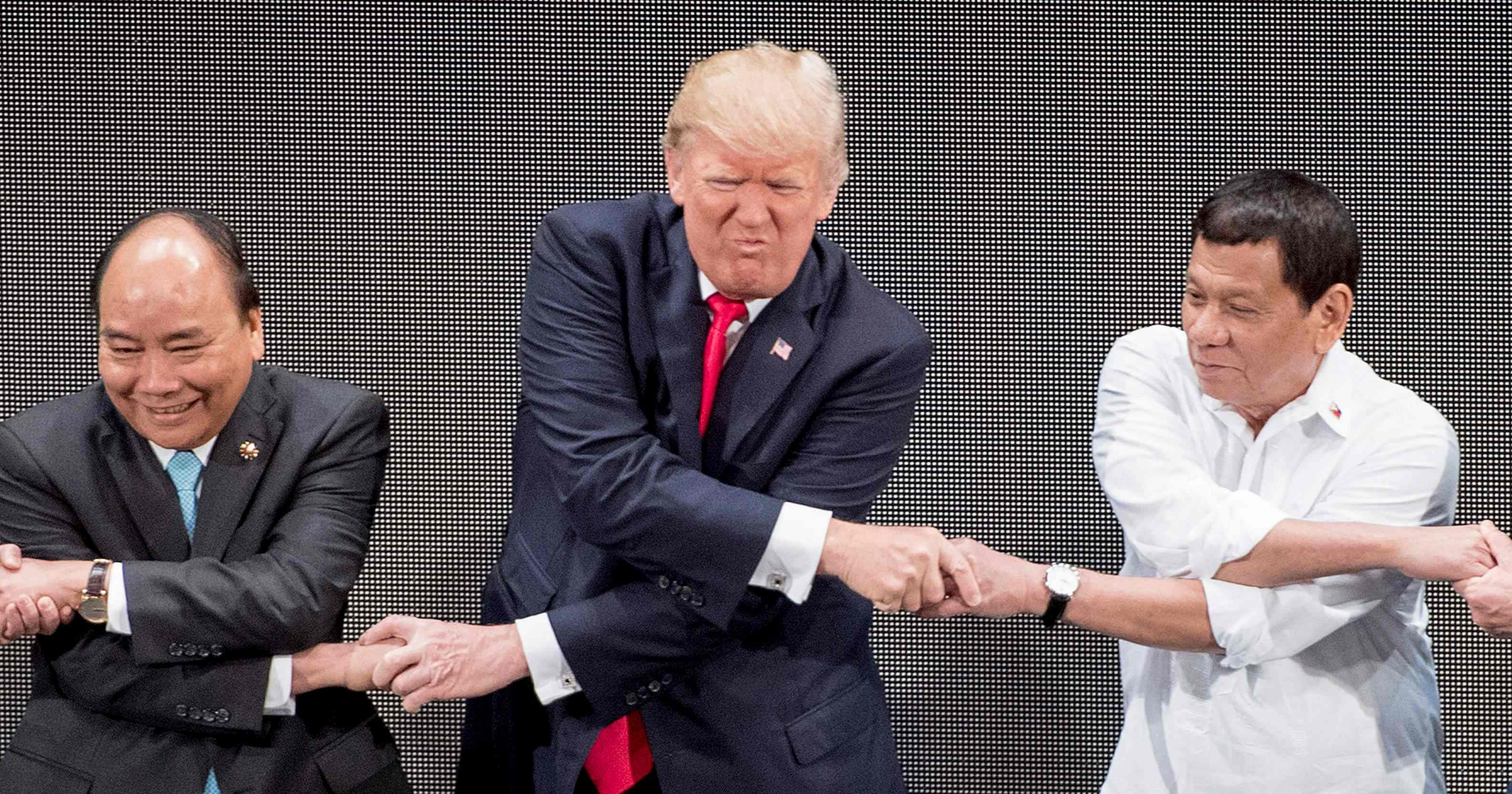 Donald Trump Gets Baffled By The Group Handshake At ASEAN Summit