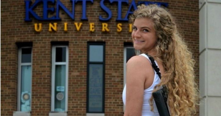 Here's Why An American Student Wore A Rifle For Her Graduation Photos