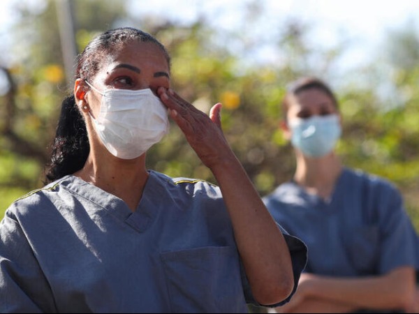 Of Loss & Life: Pictures Show How COVID-19 Is Affecting Frontline ...